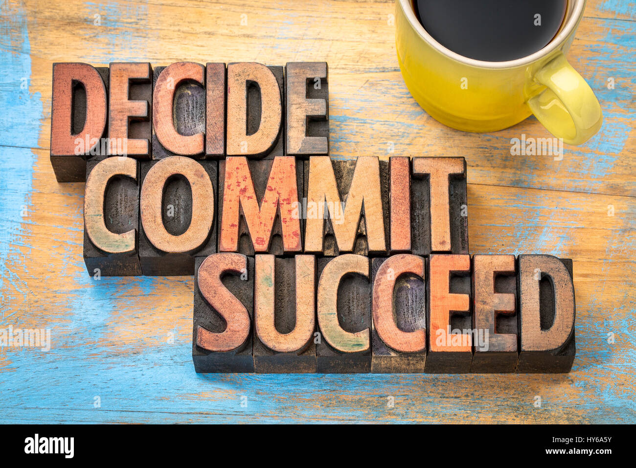 Decide, commit, succeed word abstract in vintage letterpress wood type ...
