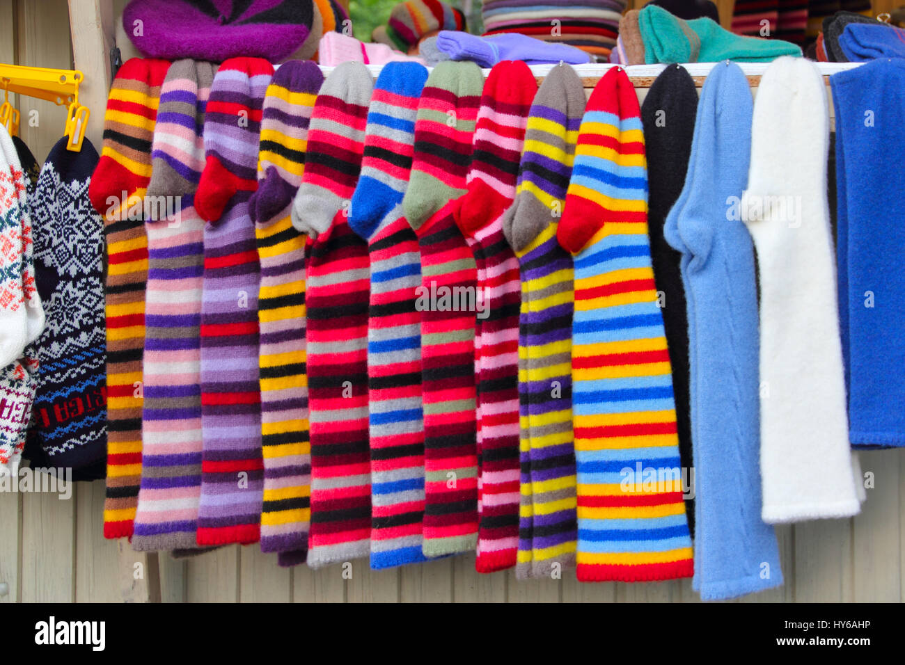 Bunch of handmade colorful woolen socks at showcase Stock Photo - Alamy