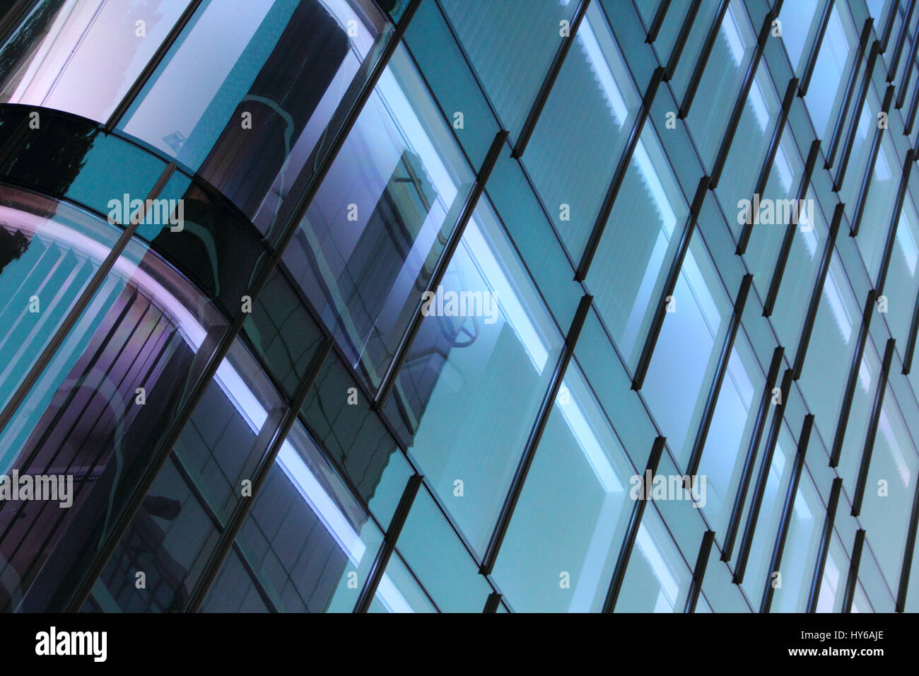 Abstract blue glass modern office building background Stock Photo - Alamy