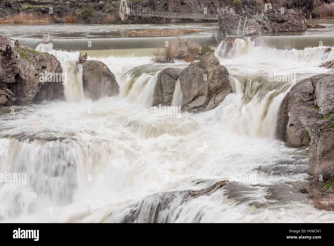 Water racing around rocks in an Idaho waterfall Stock Photo - Alamy