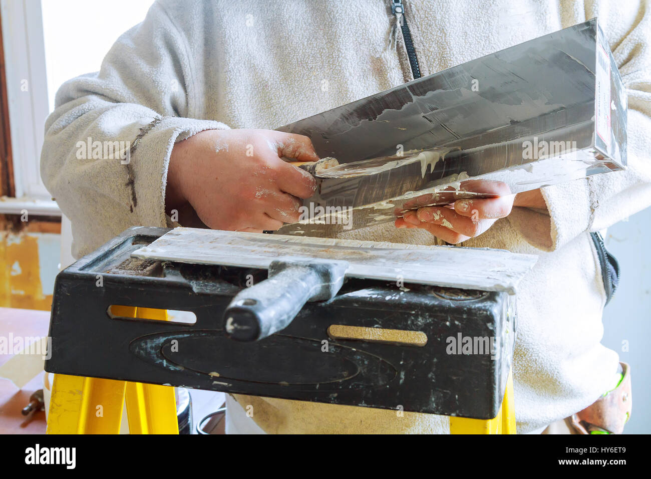 Tools for plastering walls background. Set of assorted plaster trowel ...