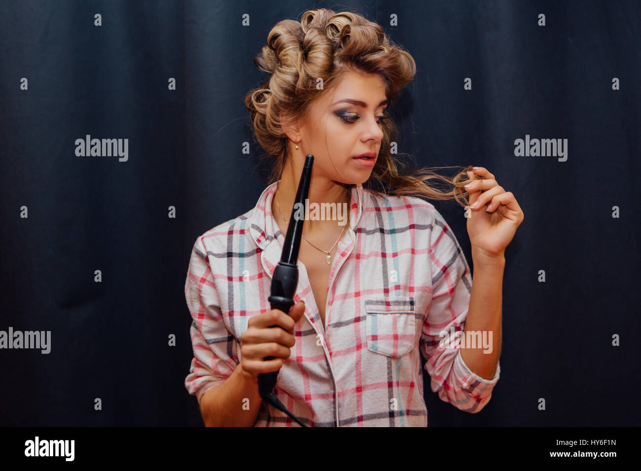 Portrait of a young girl making hairdress Stock Photo - Alamy