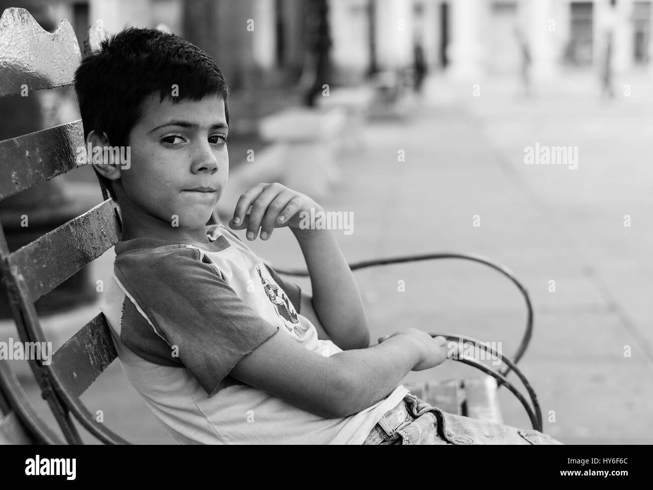 Kids playing and teens flirting in park in Cienfuegos, Cuba Stock Photo ...