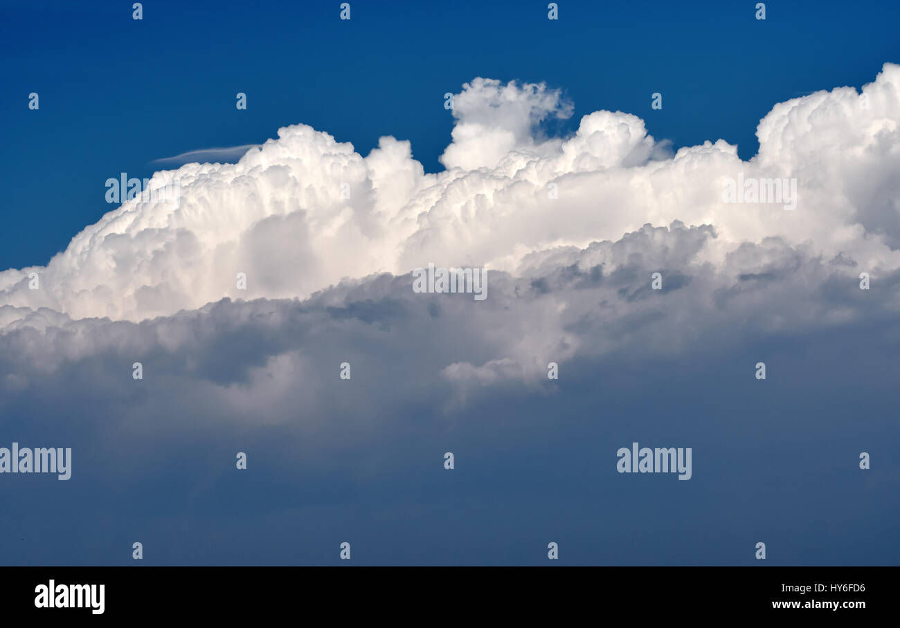 Huge cumulus clouds for background use Stock Photo - Alamy