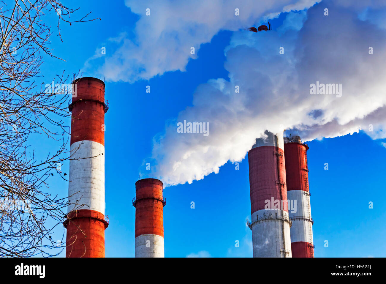 Chimneys with steam production of a thermal power station Stock Photo ...