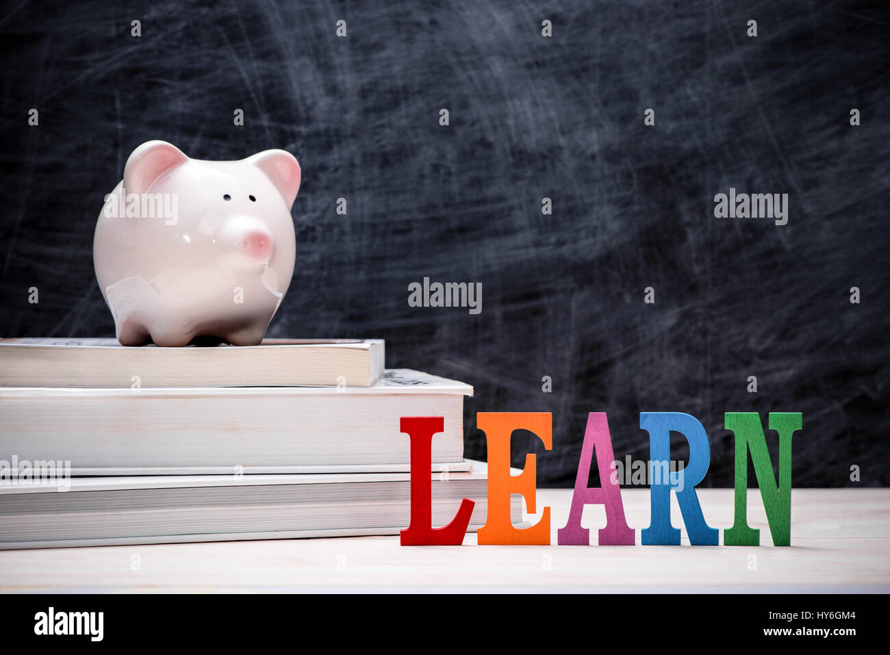 University student piggy bank hi-res stock photography and images - Alamy