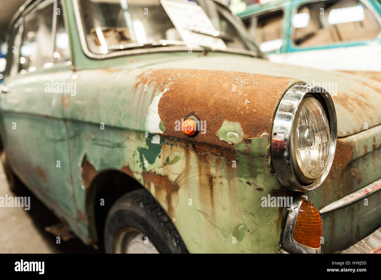 Close up on a rusted green old car Stock Photo - Alamy