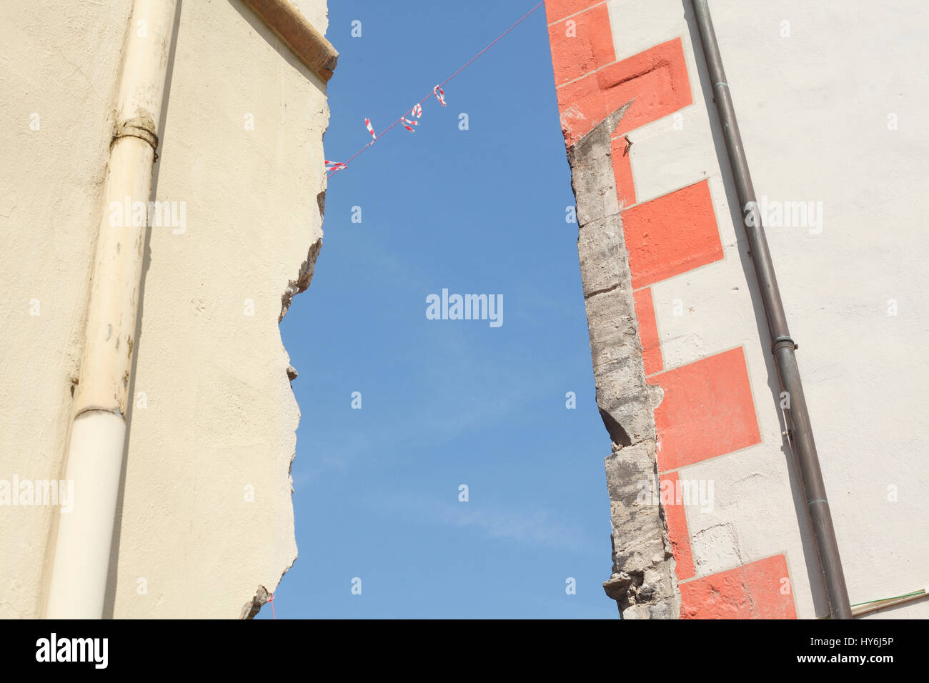 gap site between two walls Stock Photo - Alamy