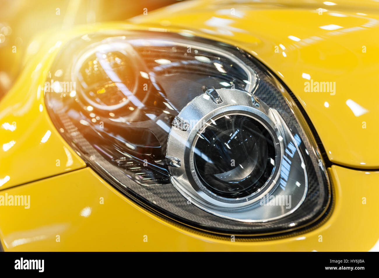 Bright yellow car in sun hi-res stock photography and images - Alamy