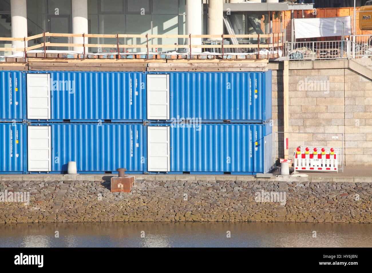 Construction site, blue container Stock Photo - Alamy