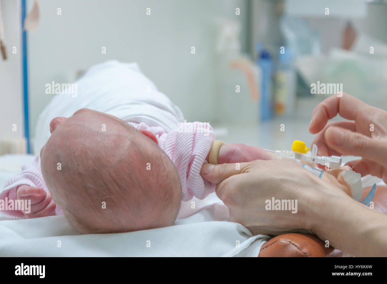 Doctor making drainage for newborn baby Stock Photo - Alamy
