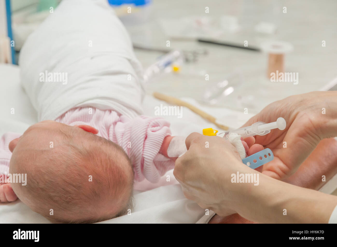 Doctor making drainage for newborn baby Stock Photo - Alamy