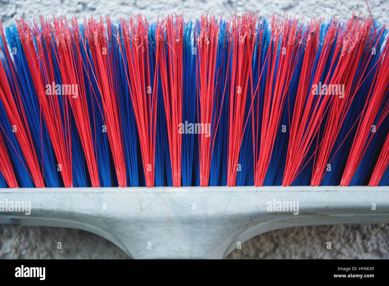 Part of a colorful broom Stock Photo - Alamy