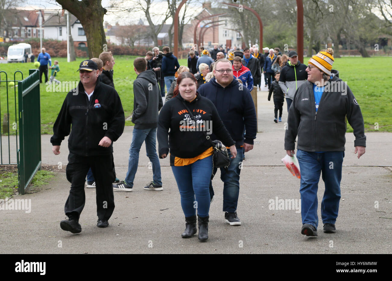 Hull City fans arriving for the Premier League match at KCOM Stadium, Hull Stock Photo - Alamy