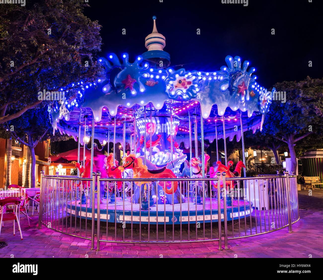 Night view of colorfully lit carousel Stock Photo - Alamy