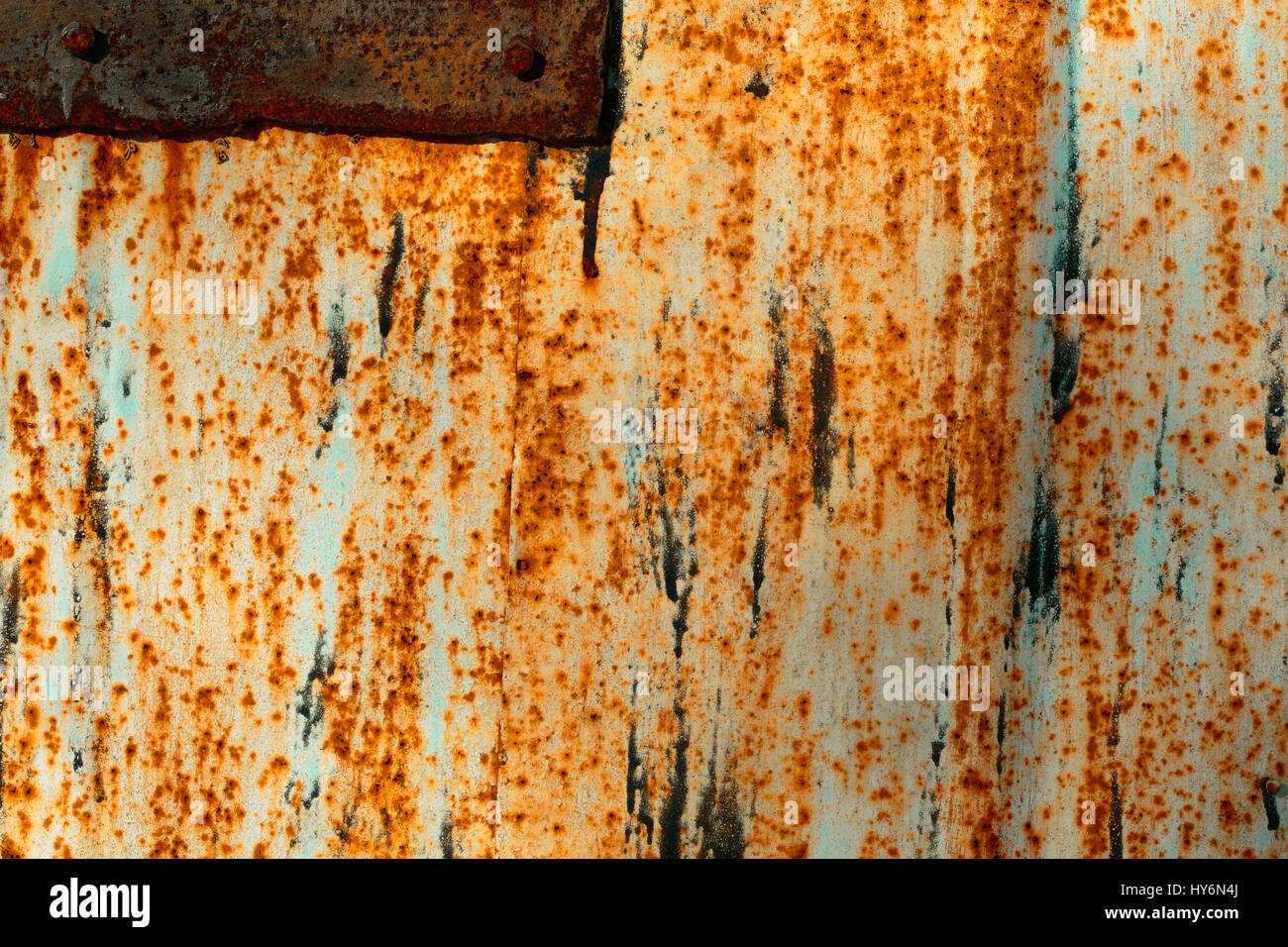 Colored rusty stained metal wall texture pattern Stock Photo - Alamy