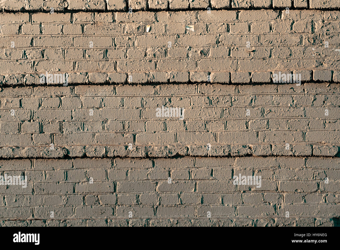 Old wall of bricks dull colors Stock Photo - Alamy