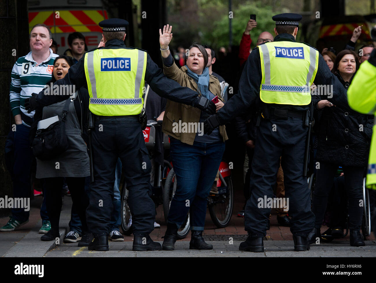 Unite Against Fascism counter protesters during a demonstration by ...