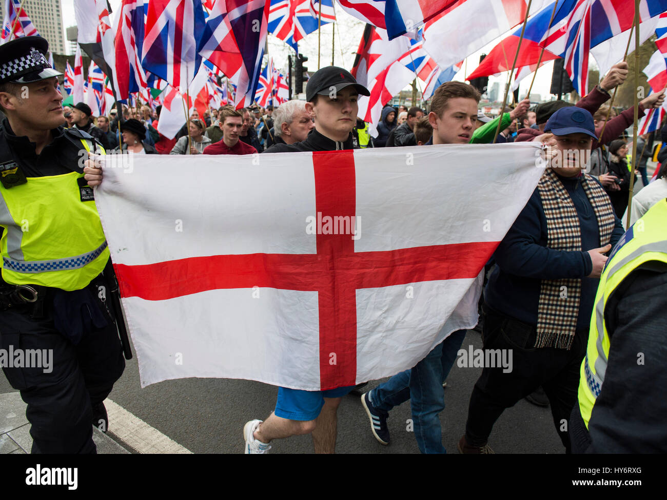 Britain First and EDL (English Defence League) protesters walk along ...