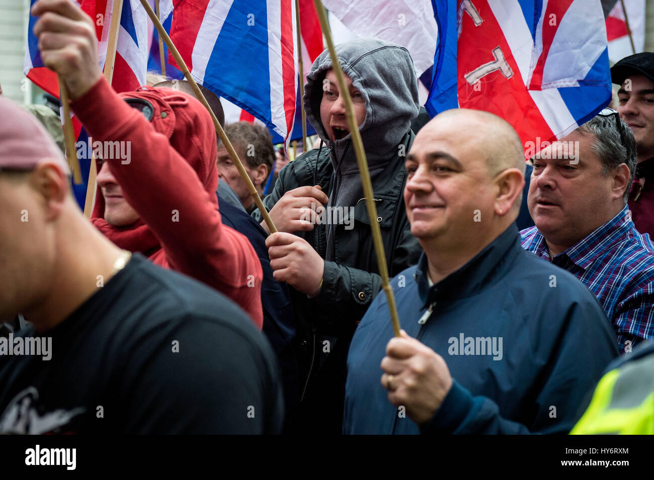 Britain First and EDL (English Defence League) protesters walk along ...