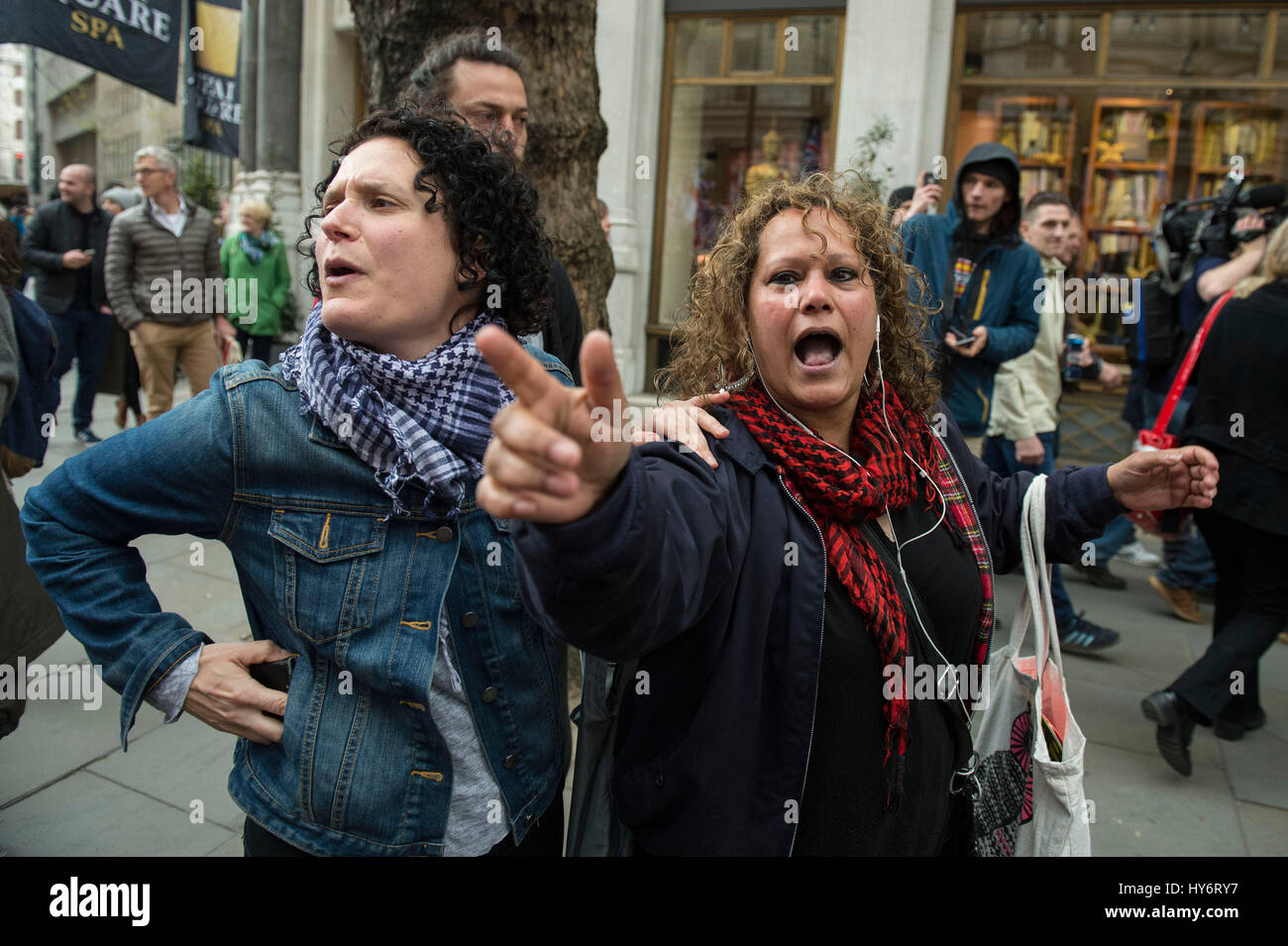 Britain First and EDL (English Defence League) protesters walk along ...