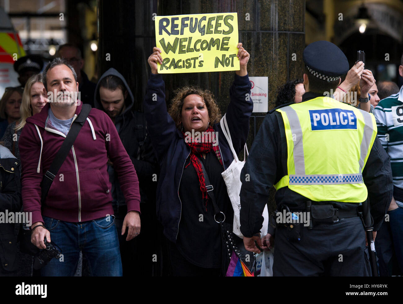 Unite Against Fascism counter protesters during a demonstration by ...
