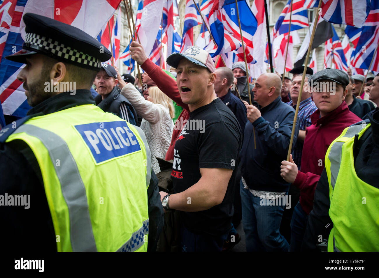 Britain First and EDL (English Defence League) protesters walk along ...