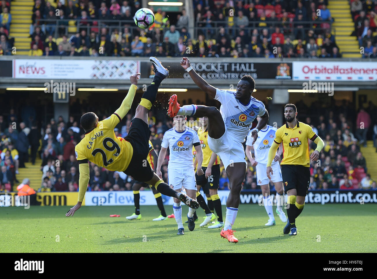 Watford's Etienne Capoue (left) and Sunderland's Lamine Kone in action ...