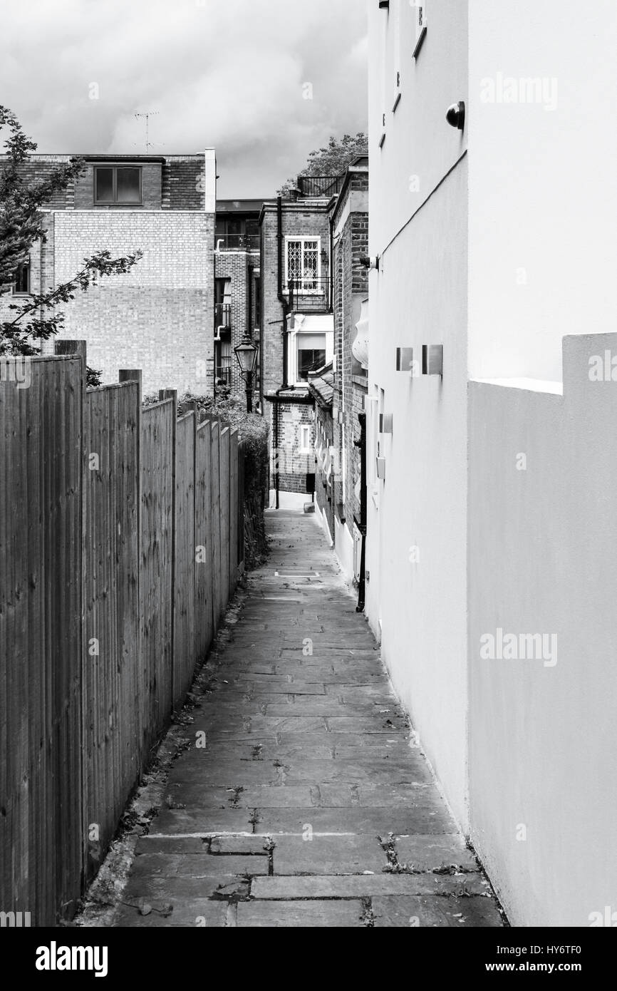 Narrow alley between houses hi-res stock photography and images - Alamy