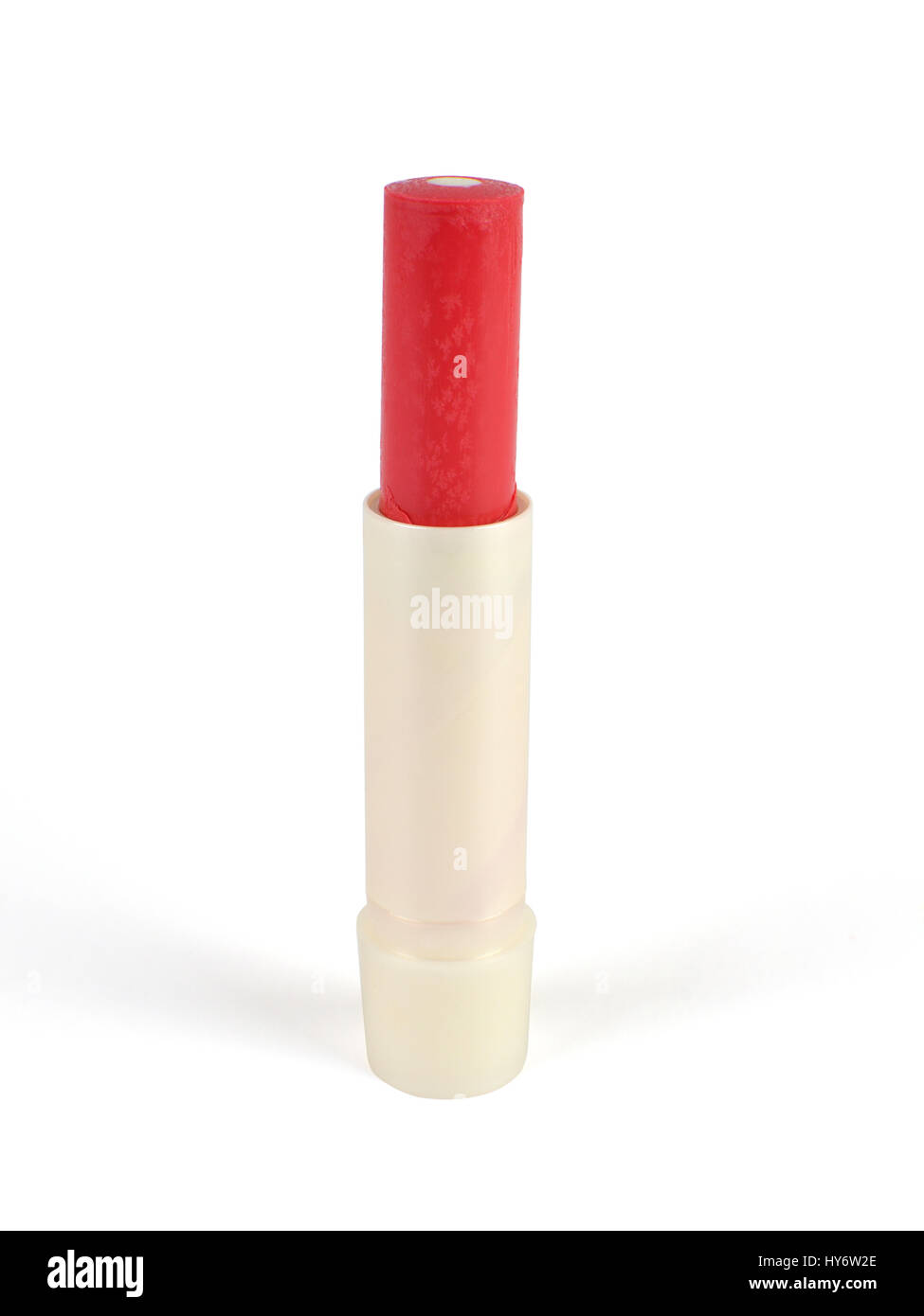 Open stick of a red lip balm on white background Stock Photo - Alamy
