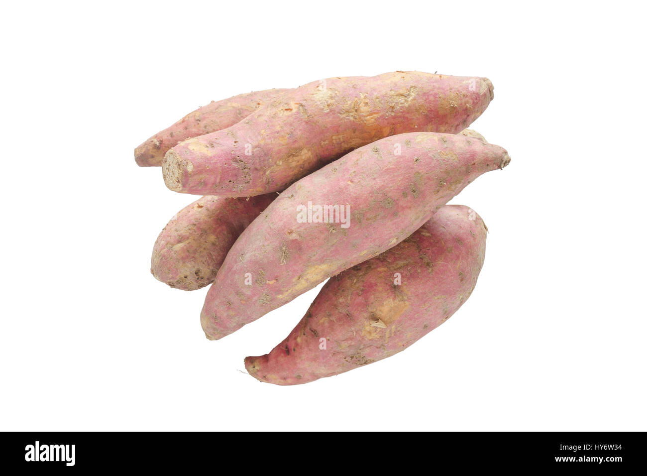 Raw sweet potato isolated on white background Stock Photo - Alamy