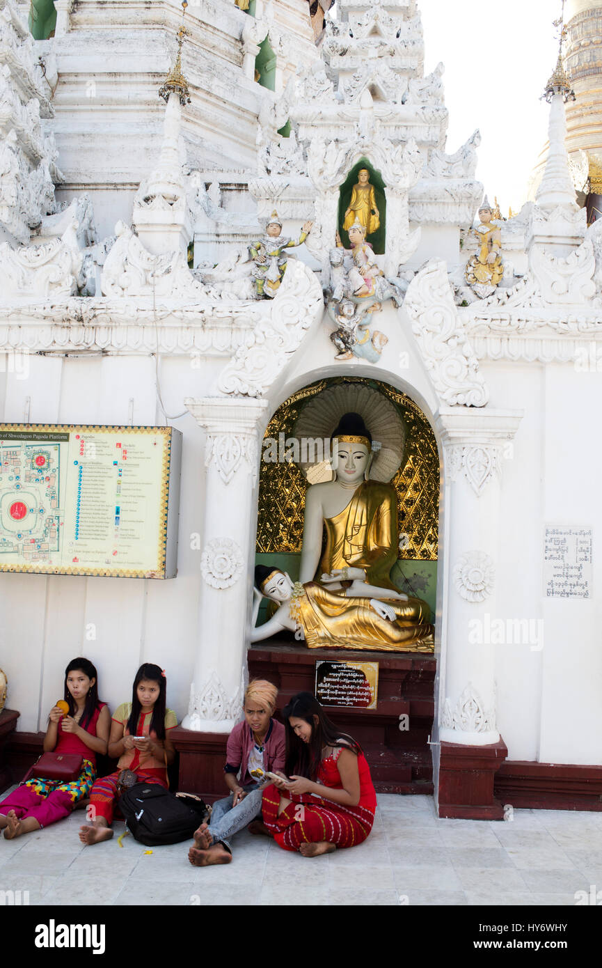 Myanmar (Burma). Yangon. Shwedagon pagoda . Factory workers visit on a ...