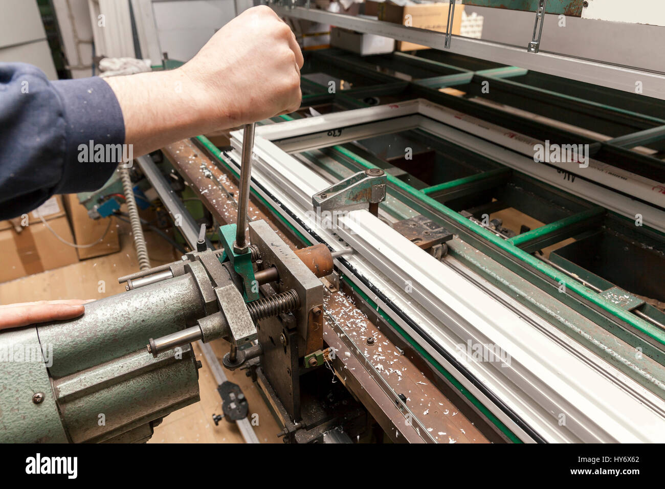 machine for assembly of plastic windows, close up Stock Photo - Alamy