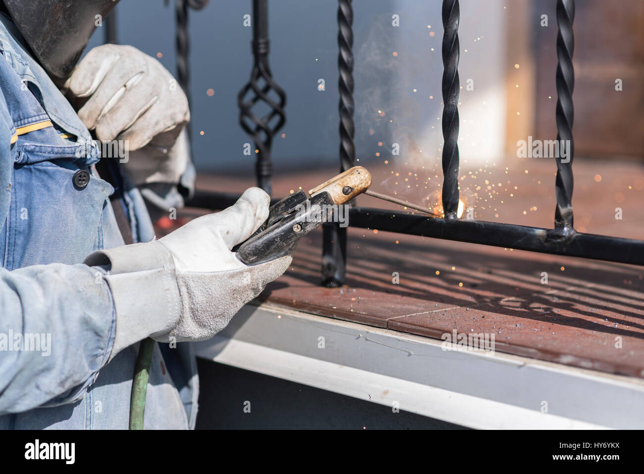 Worker gloves welding railings hi-res stock photography and images - Alamy