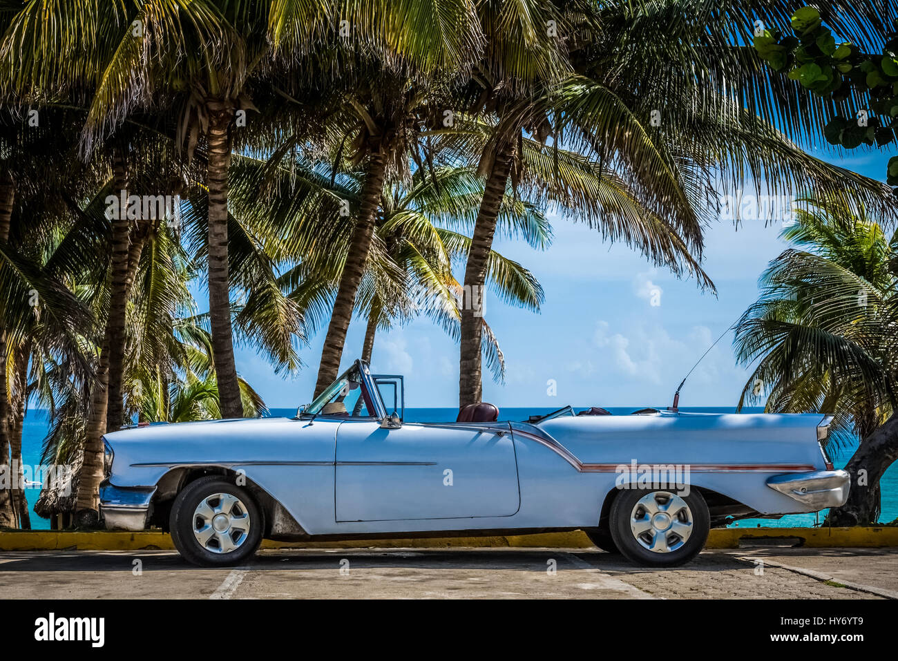 American beautiful convertible classic car parked near the beach in ...