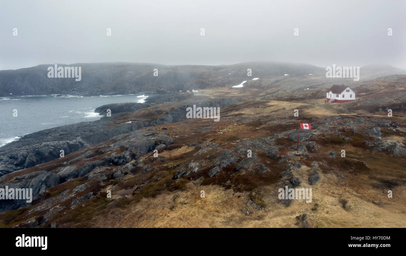Stormy day at Lighthouse Cove, with small keeper's cottage, Cape Bauld ...