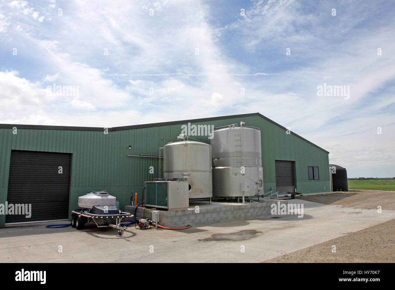 Exterior of New Zealand Rotary Dairy Shed Stock Photo - Alamy