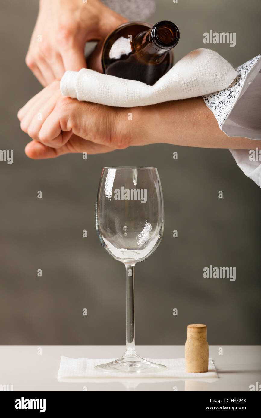 Male waiter butler serving pouring hi-res stock photography and images ...
