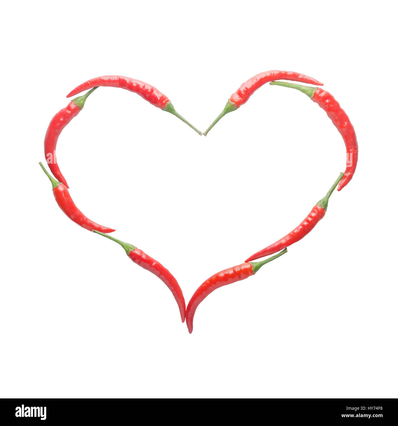 Heart shape from red chili isolated on white background Stock Photo - Alamy