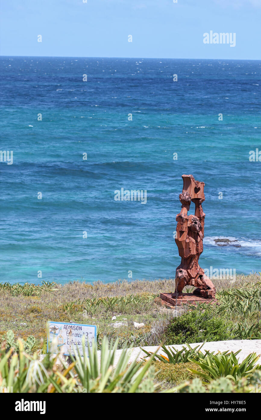 Sculpture of a person in Isla MUjeres island Stock Photo - Alamy