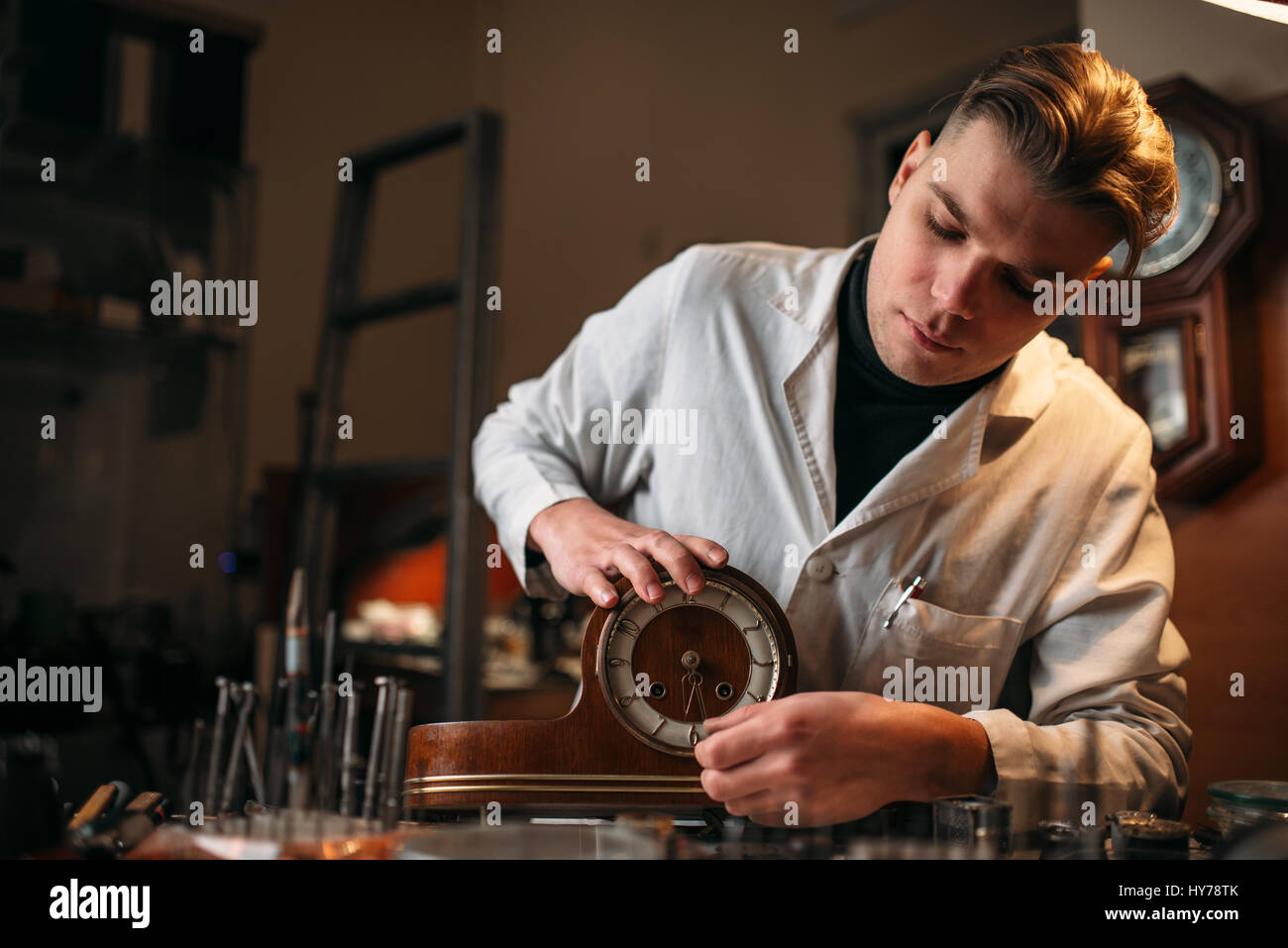 Mechanical wooden man clock hi-res stock photography and images - Alamy