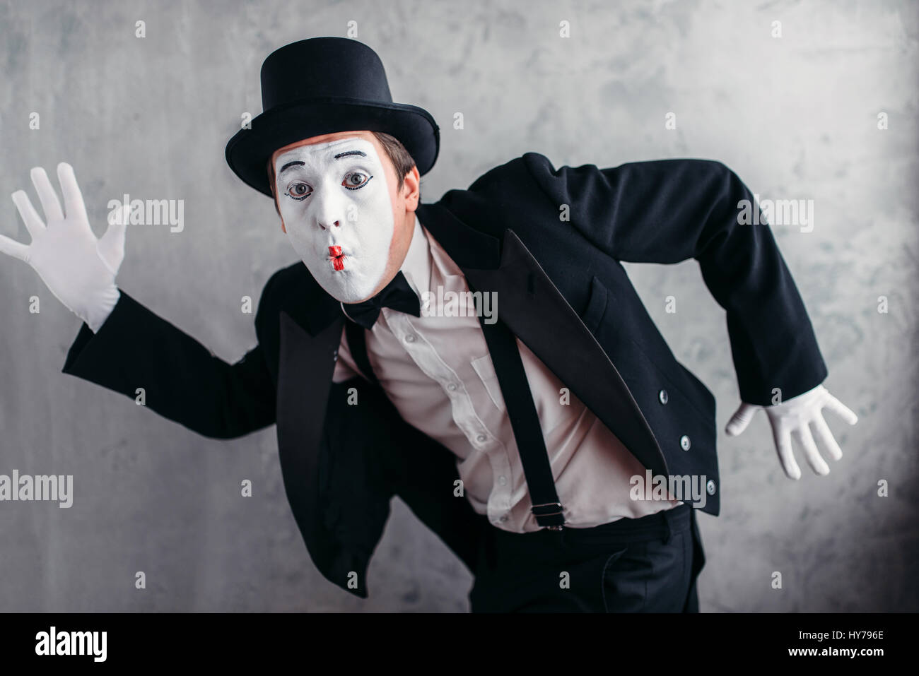 Pantomime theater artist posing, mimic male person with white makeup ...