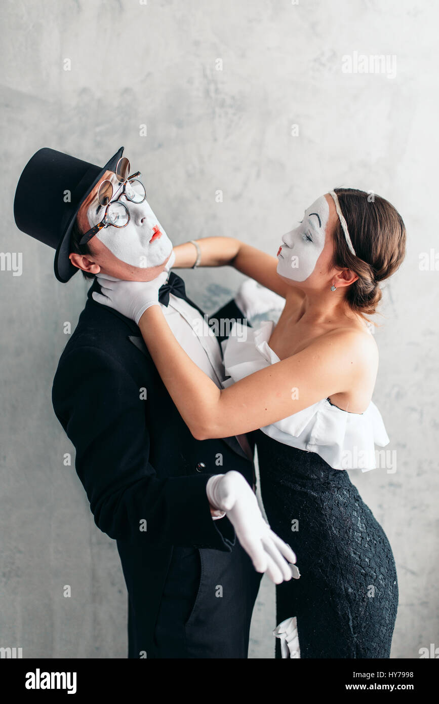 Two pantomime theater artists performing. Mime actors with white makeup ...
