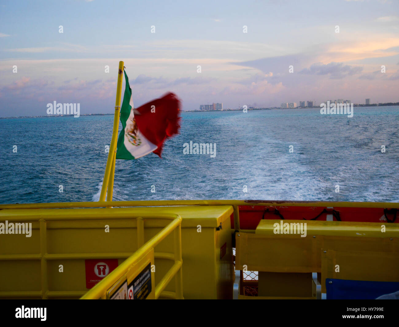 Mexican flag in the boat on the ocean Stock Photo - Alamy