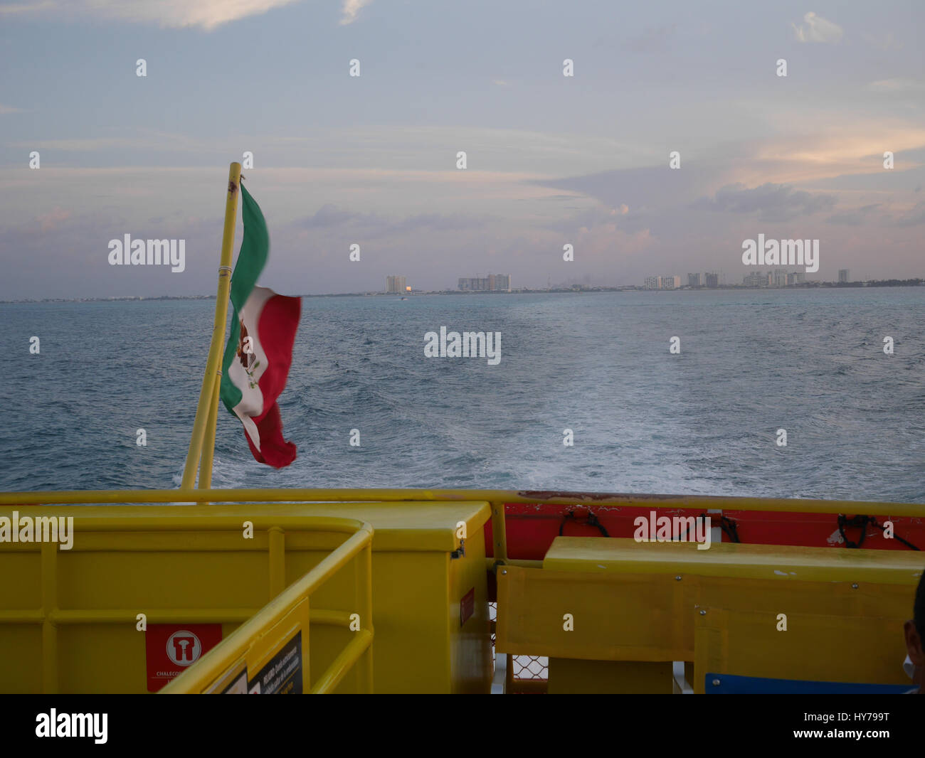 Mexican flag in the boat on the ocean Stock Photo - Alamy
