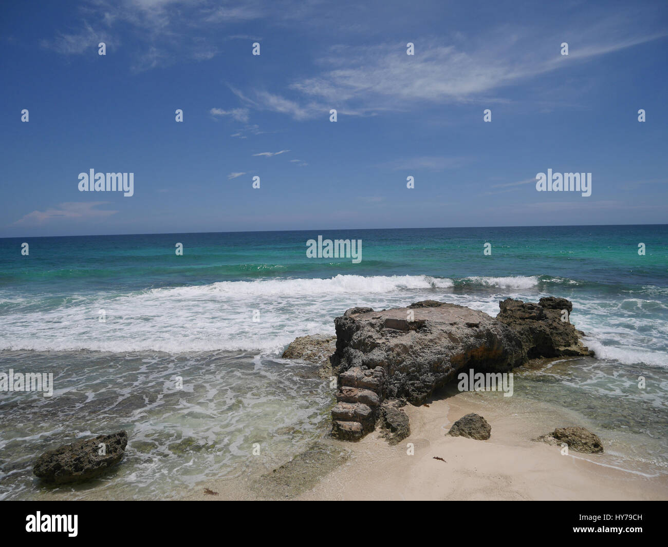 Shore with rocks and cliffs to a caribbean sea Stock Photo - Alamy