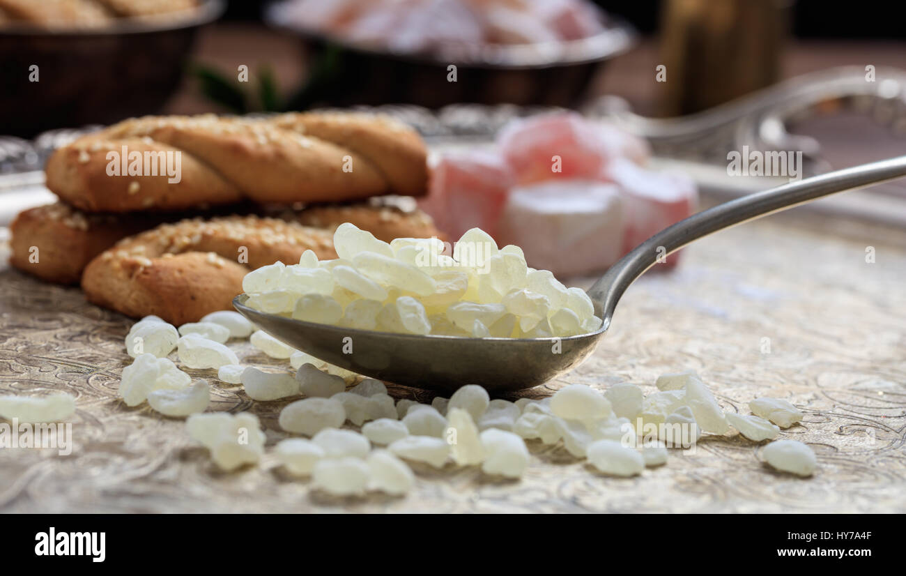 Chios mastic tears in a spoon on a silver background Stock Photo - Alamy