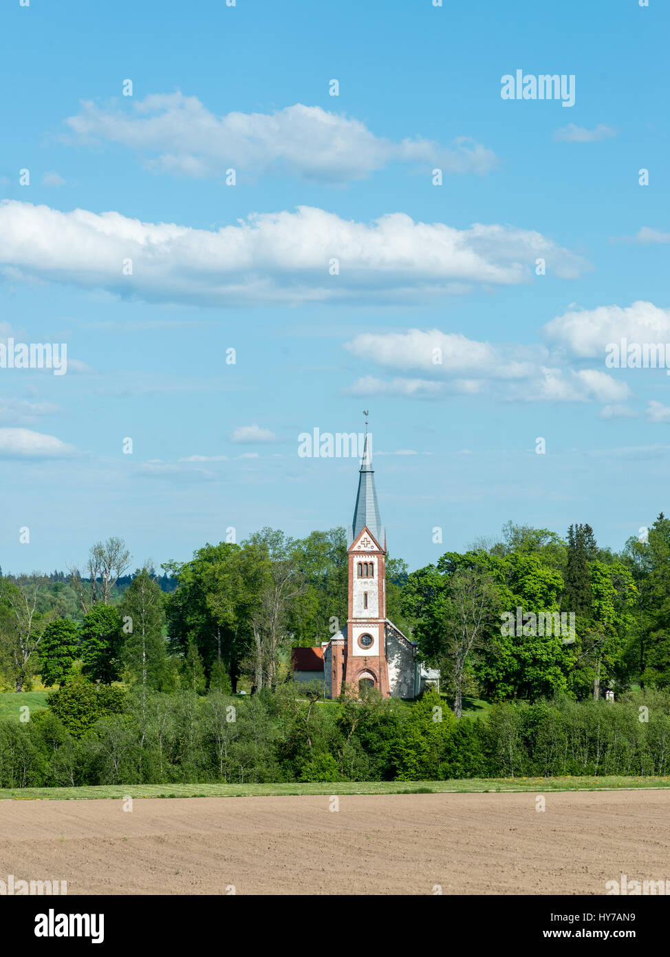 countryside church in summer in small village Stock Photo - Alamy