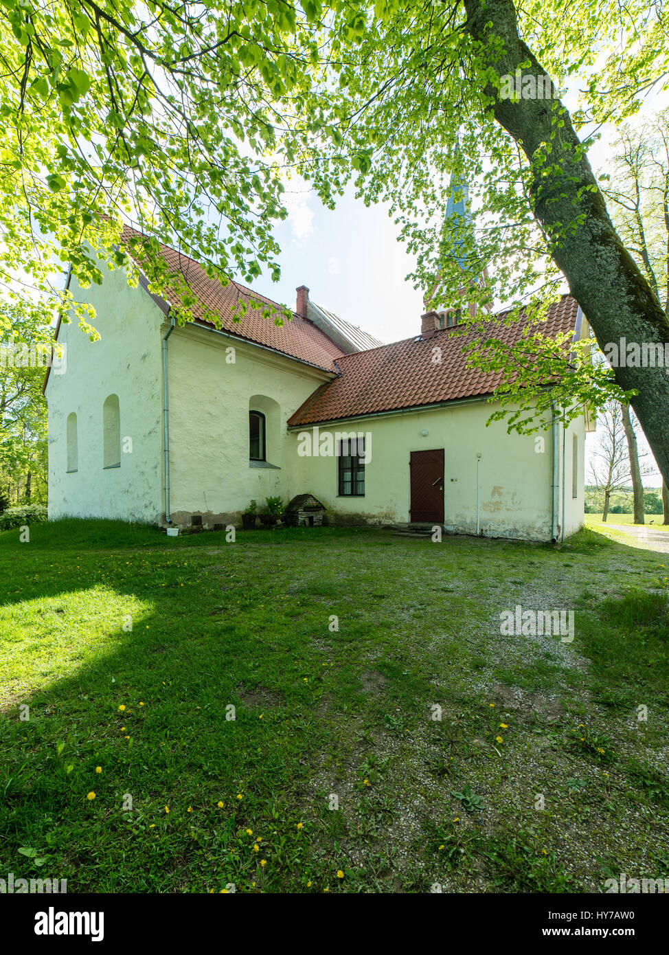 countryside church building in summer in small village Stock Photo - Alamy