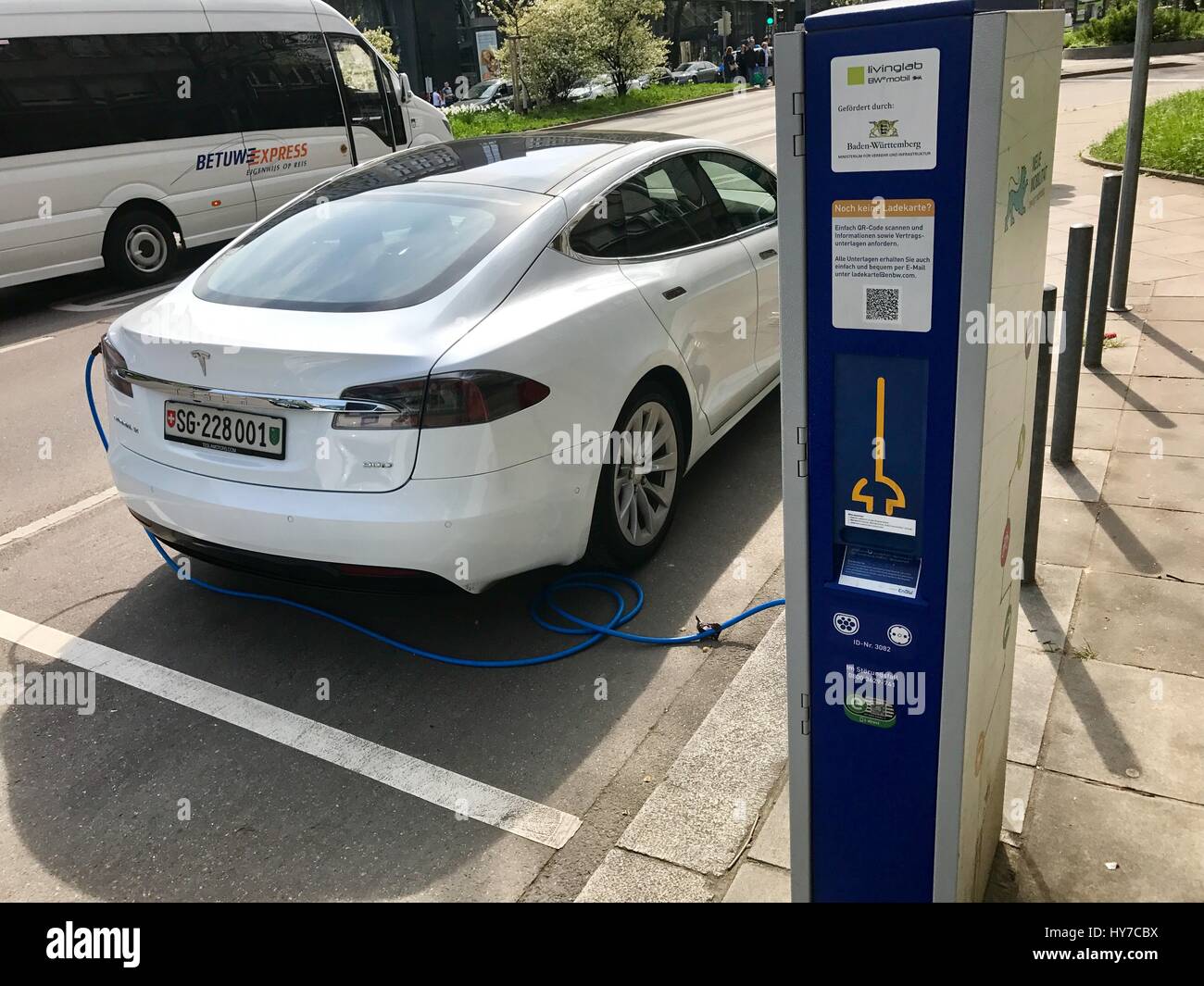 Tesla Model S being charged Stock Photo - Alamy
